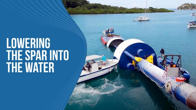 Lowering the Spar into the Water - Ocean Builders